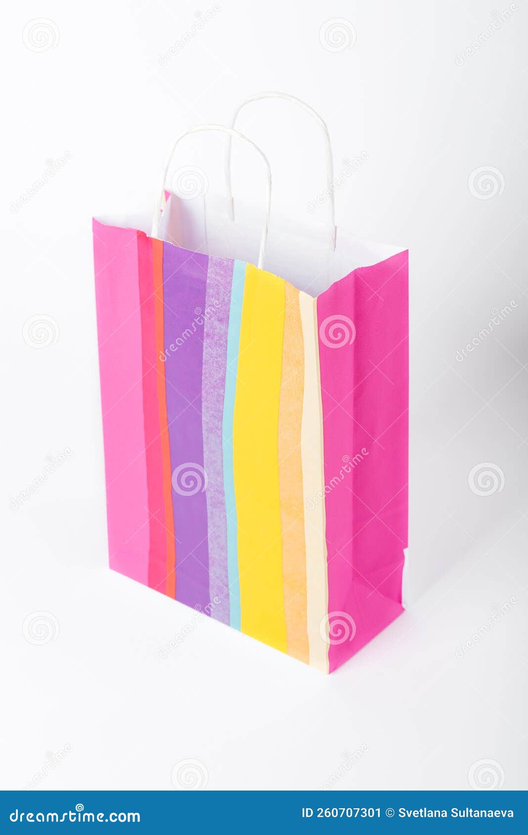 One Bright Multi-colored Gift Bag on a White Background Stock Image ...