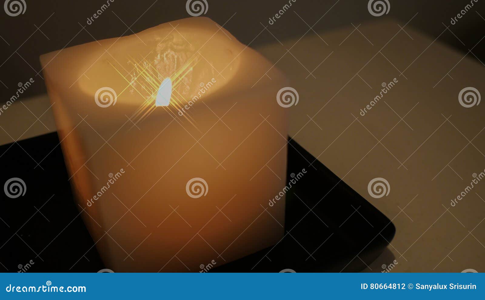 One Candle Glowing in Dim Light Stock Photo - Image of concept, black ...