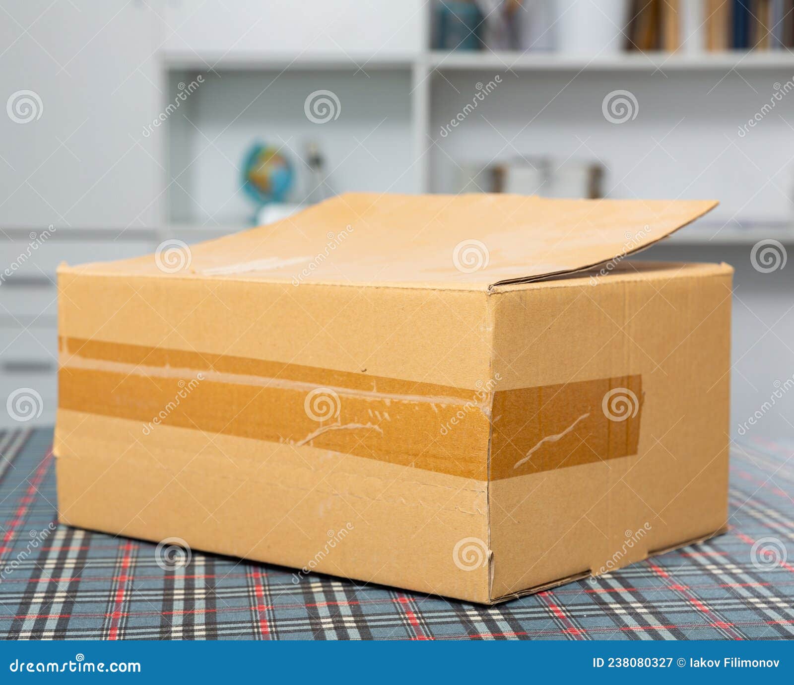 One Cardboard Box on Top of Table Stock Image - Image of delivering ...