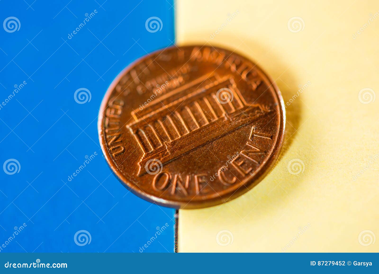 One Cent Coin in Yellow Blue Background Stock Photo - Image of penny ...