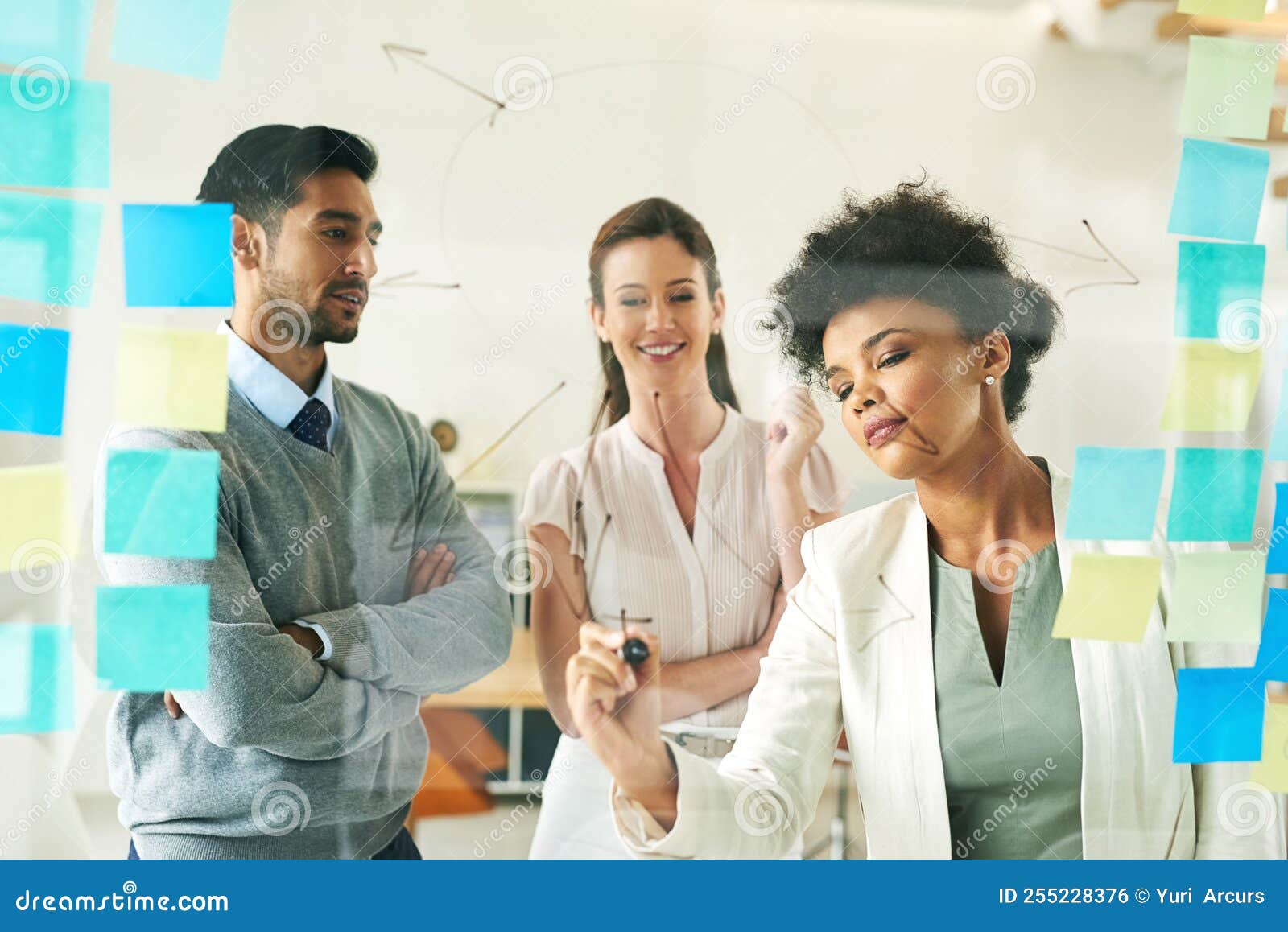 One Challenge, Many Solutions. a Group of Young Colleagues Having a ...