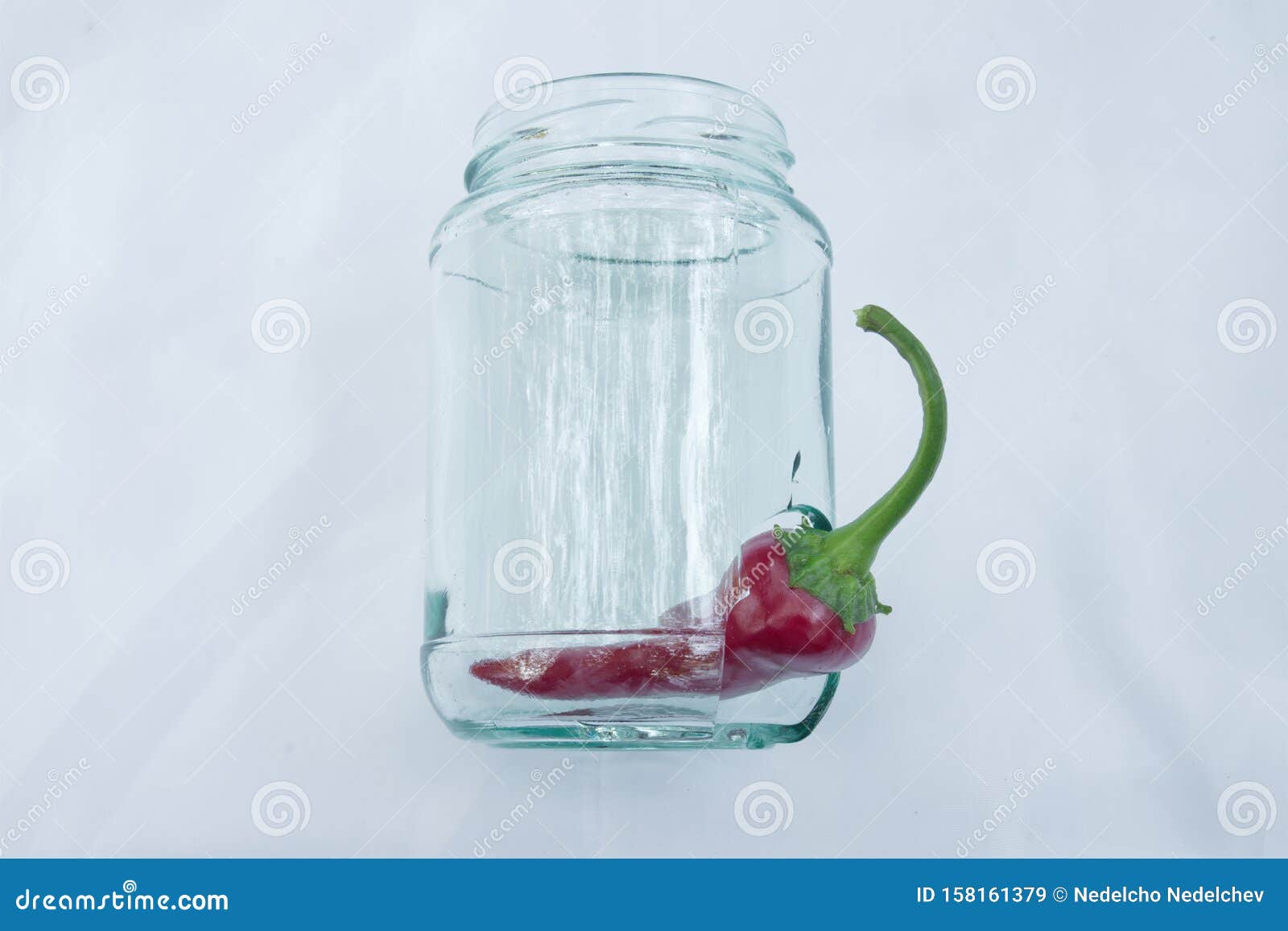 One Chili Pepper in a Broken Jar Stock Image - Image of damage, kitchen ...