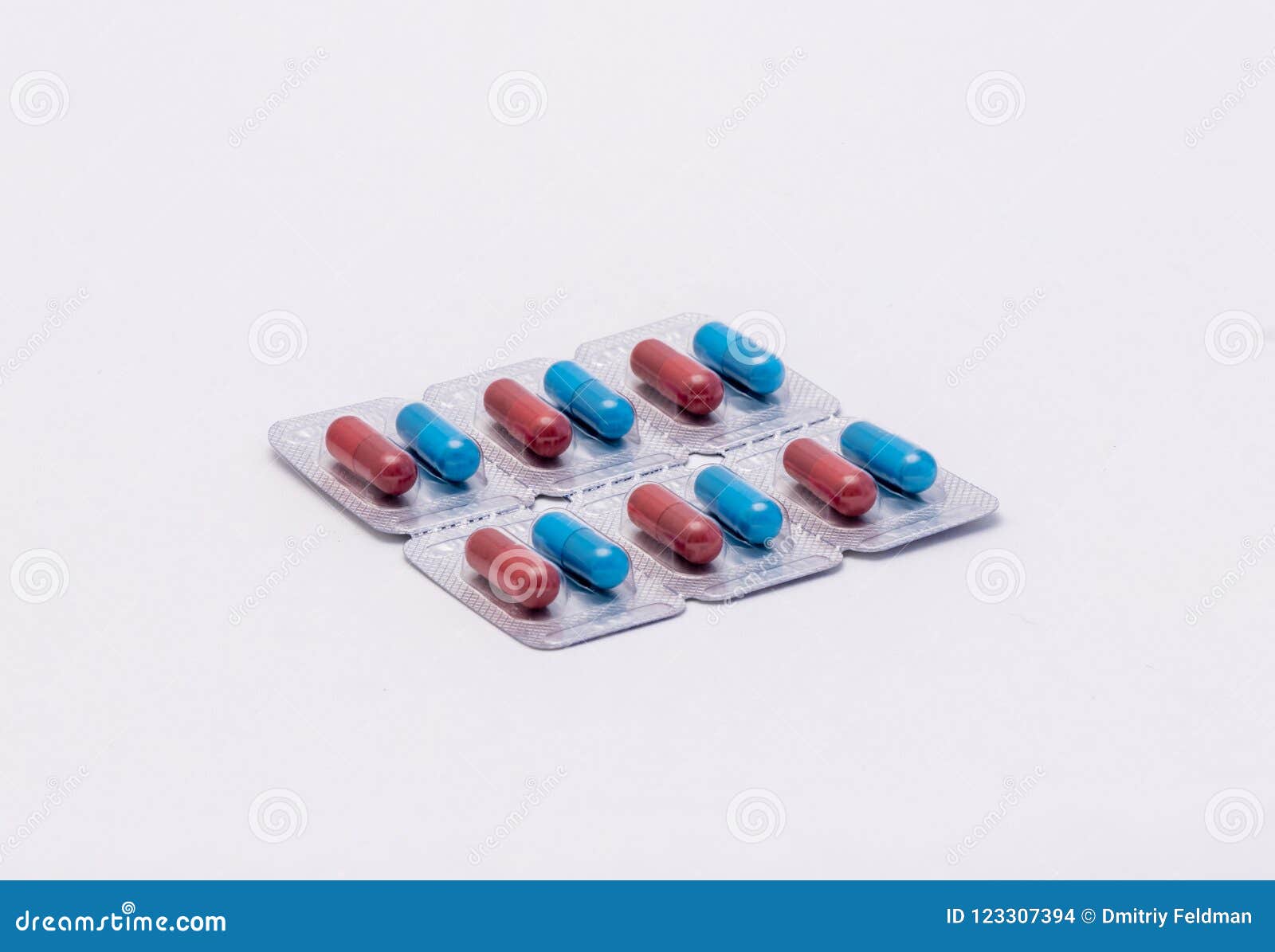 One Complete Sealed Package with Blue and Brown Rectangular Pills Lying ...