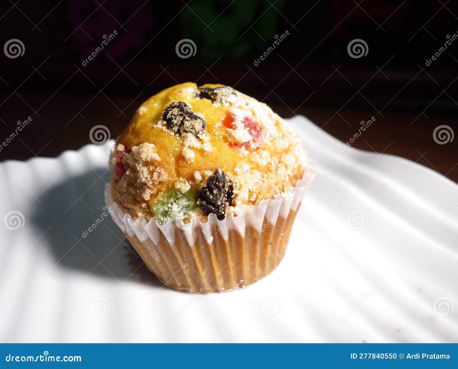 One Cupcake Muffin with Sliced Fruit Spread on a Rectangular White ...