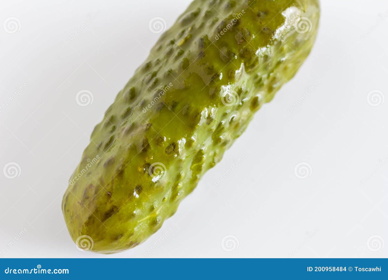 One Dill Pickle Close Up Isolated on White Background Stock Photo ...