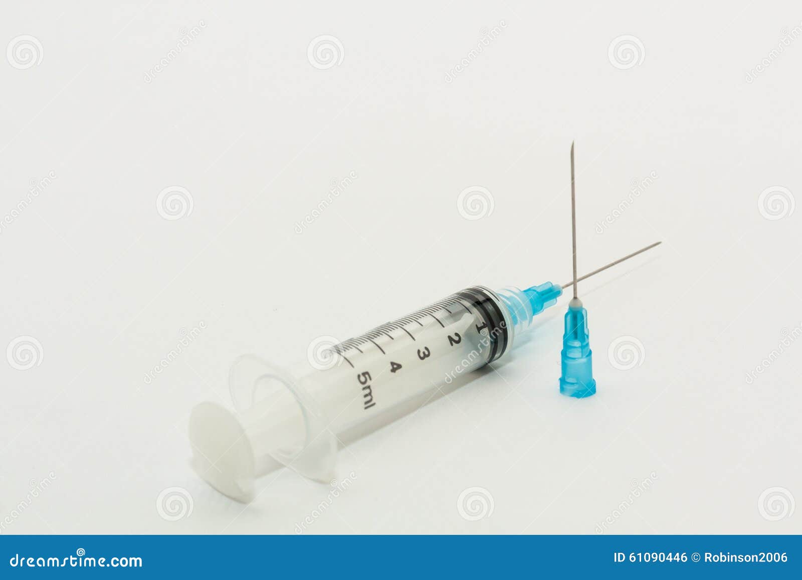 One Disposable Plastic 5ml Syringe and Blue Needle Stock Photo - Image ...