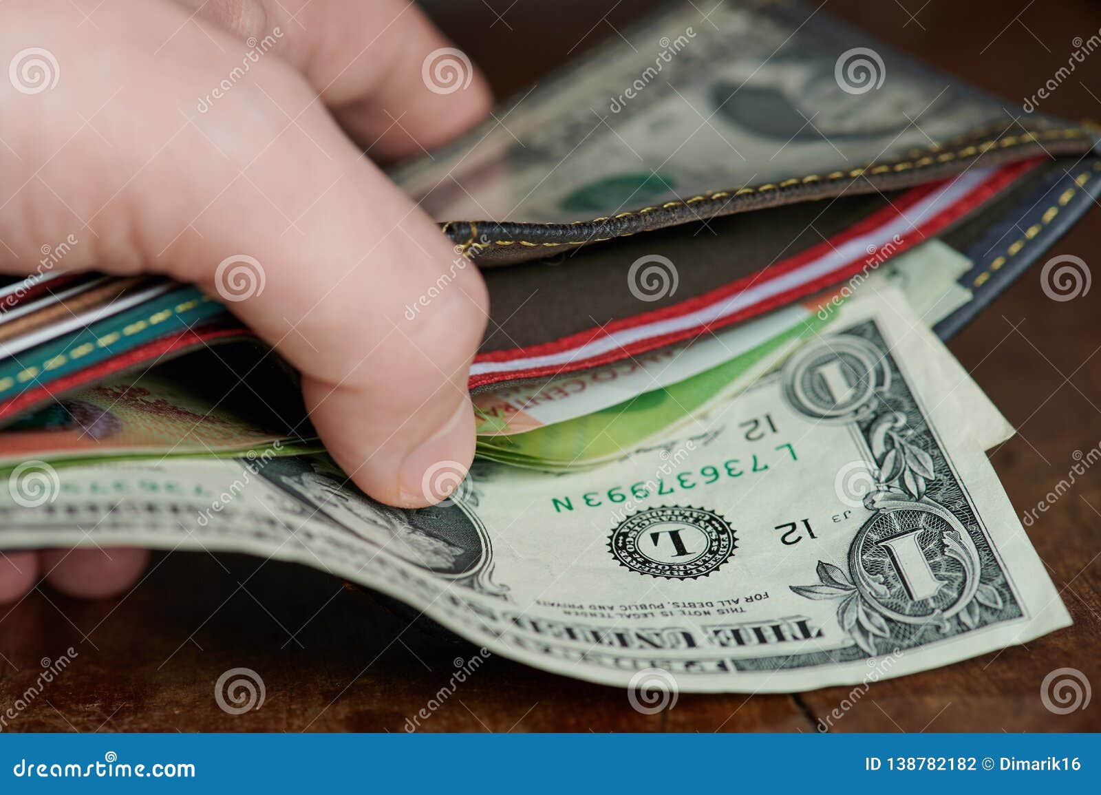 One Dollar Banknote in Wallet Stock Photo - Image of wooden, wallet ...