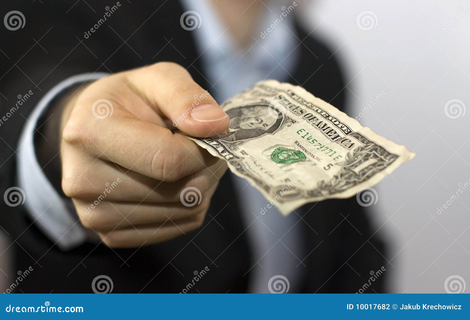 One Dollar Bill in hand stock photo. Image of deal, give - 10017682