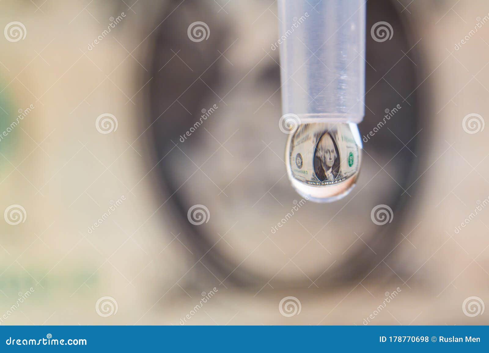 One Dollar Bill Reflects in a Drop. Saving Money or Last Dollar Concept ...