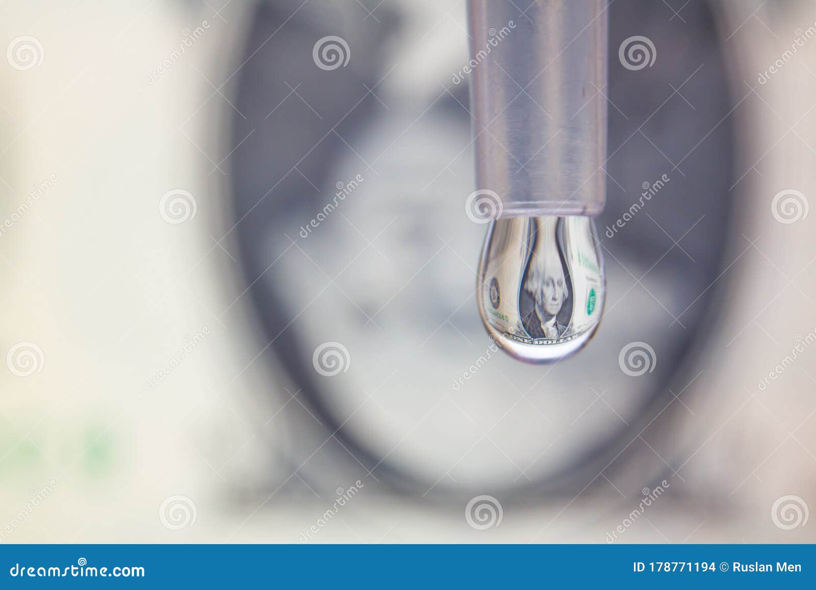 One Dollar Bill Reflects in a Drop. Saving Money or Last Dollar Concept ...