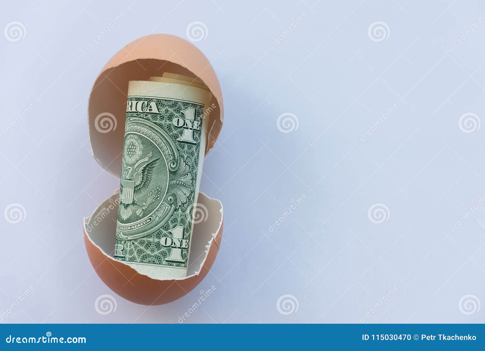 One Dollar in an Egg Shell on White Background Stock Photo - Image of ...