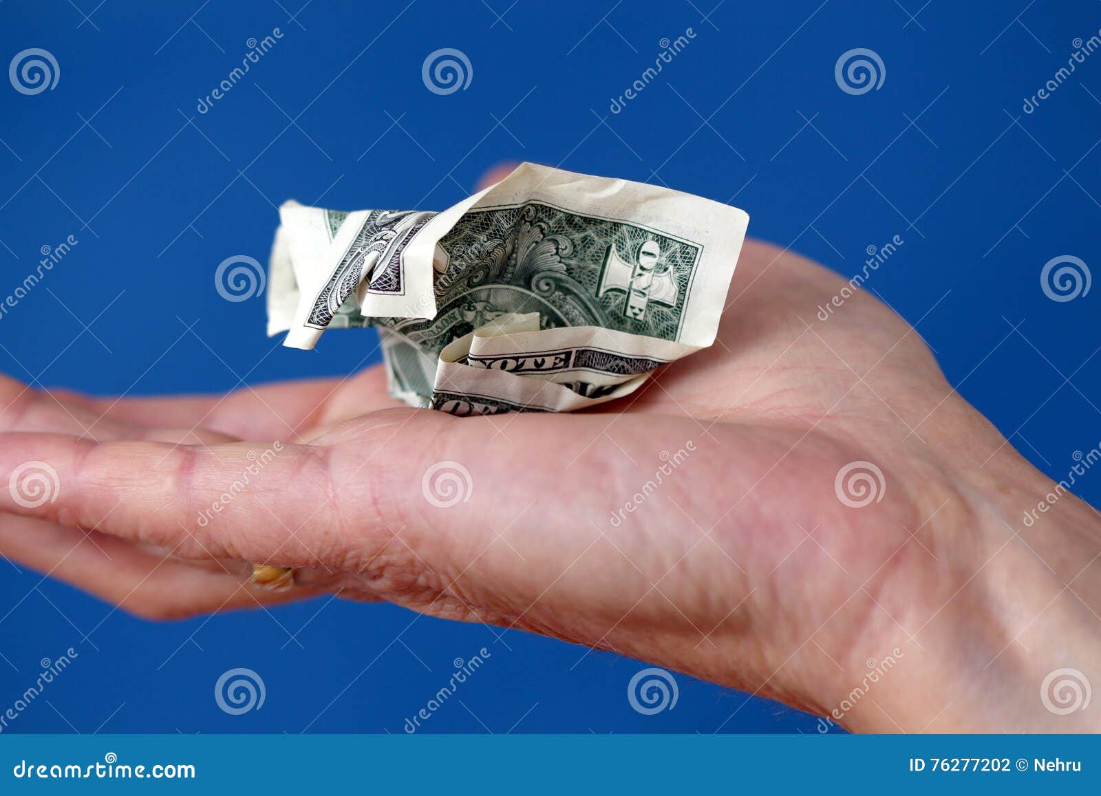 One dollar on a hand stock photo. Image of closeup, american - 76277202