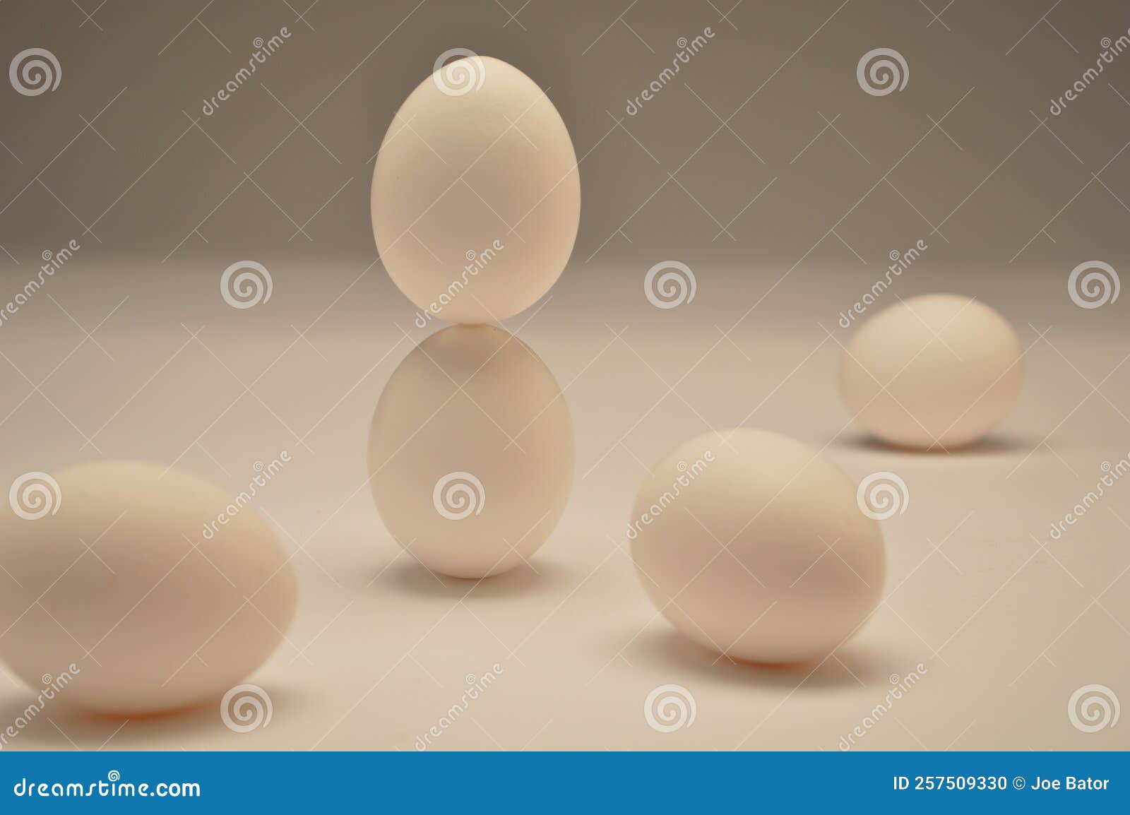 One Egg Balancing on Another Stock Photo - Image of unique, remarkable ...