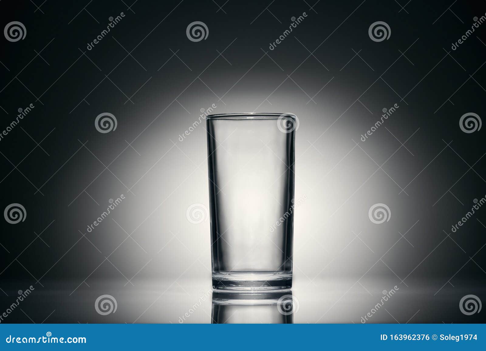 One Empty Glass for Water on a Dark Background Stock Photo - Image of ...