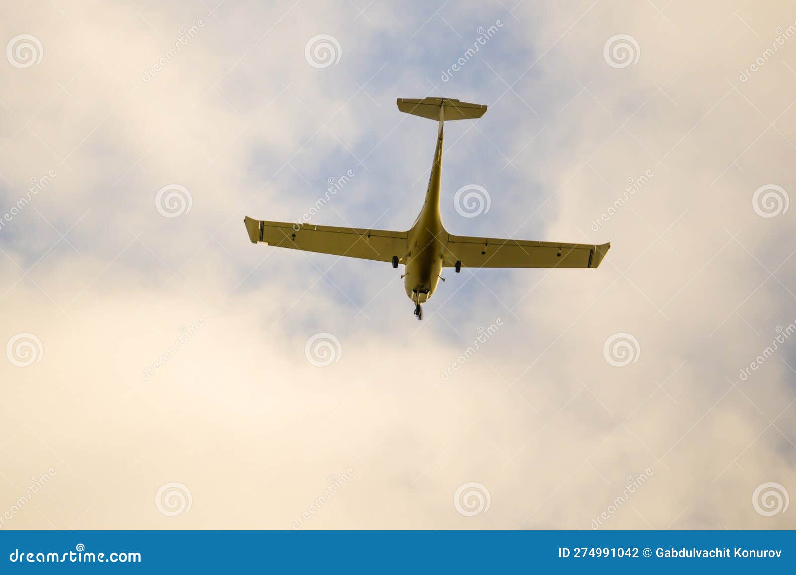 One-engine Plane Flying Under Clouds in Blue Sky Stock Photo - Image of ...