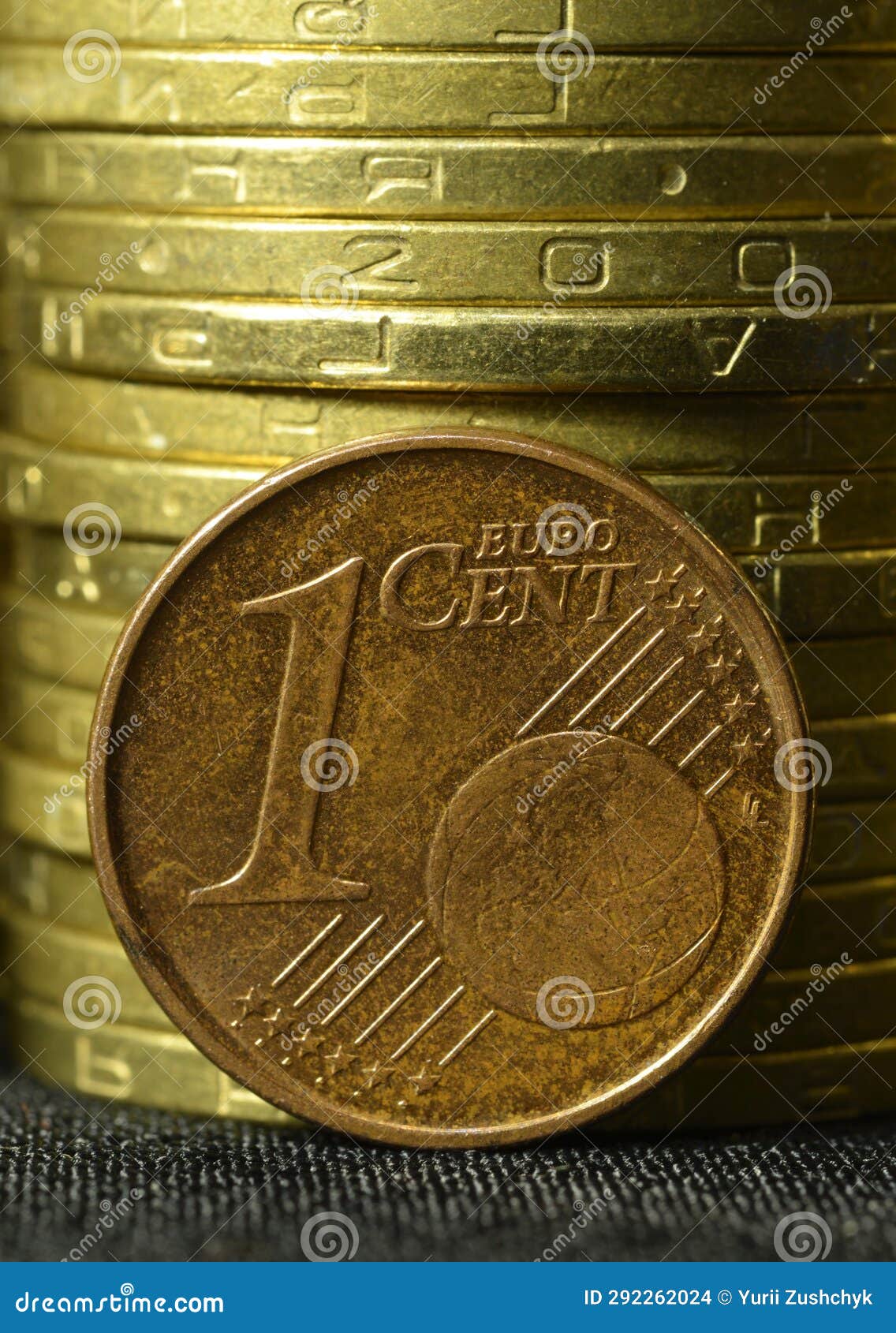One Euro Cent Coin Placed on Edge in Front of Piles of Coins Stock ...