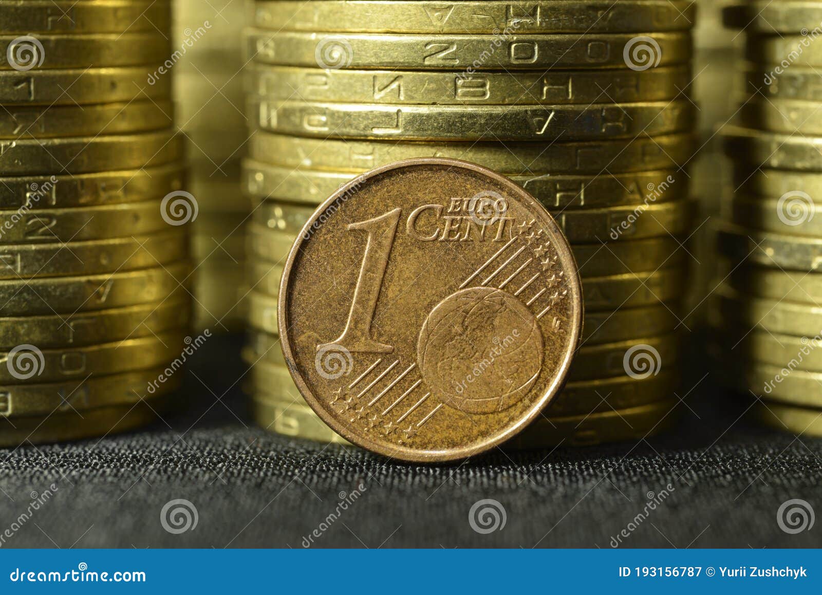 One Euro Cent Coin Placed on Edge in Front of Piles of Coins Stock ...