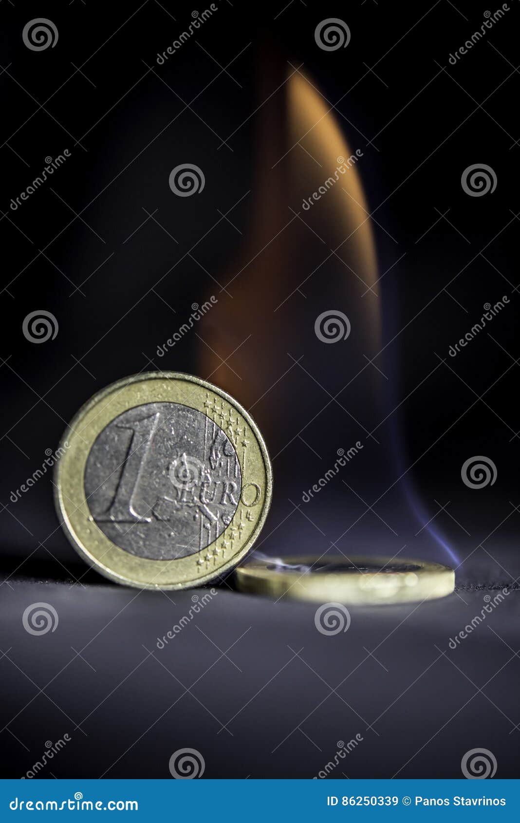 One euro coins on fire stock image. Image of background - 86250339