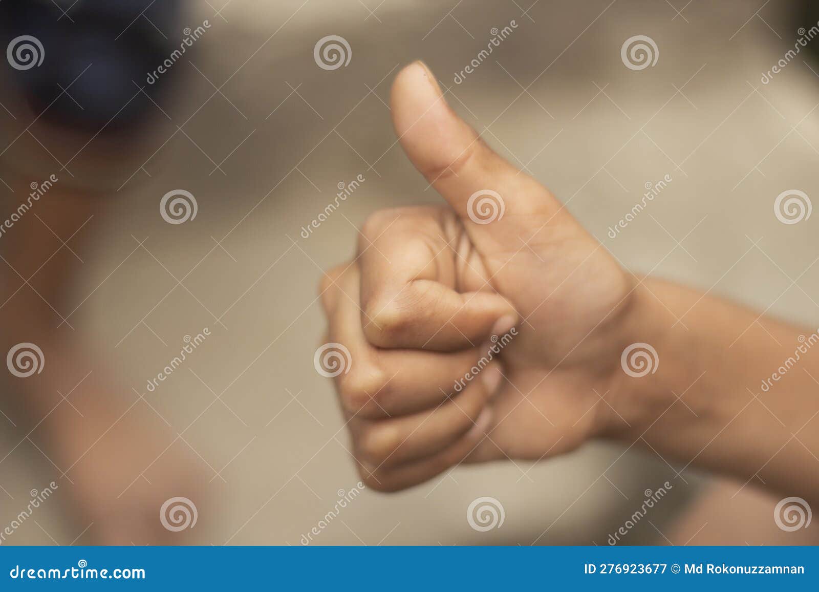 One Finger of One Hand is Raised and the Rest are Folded and the ...