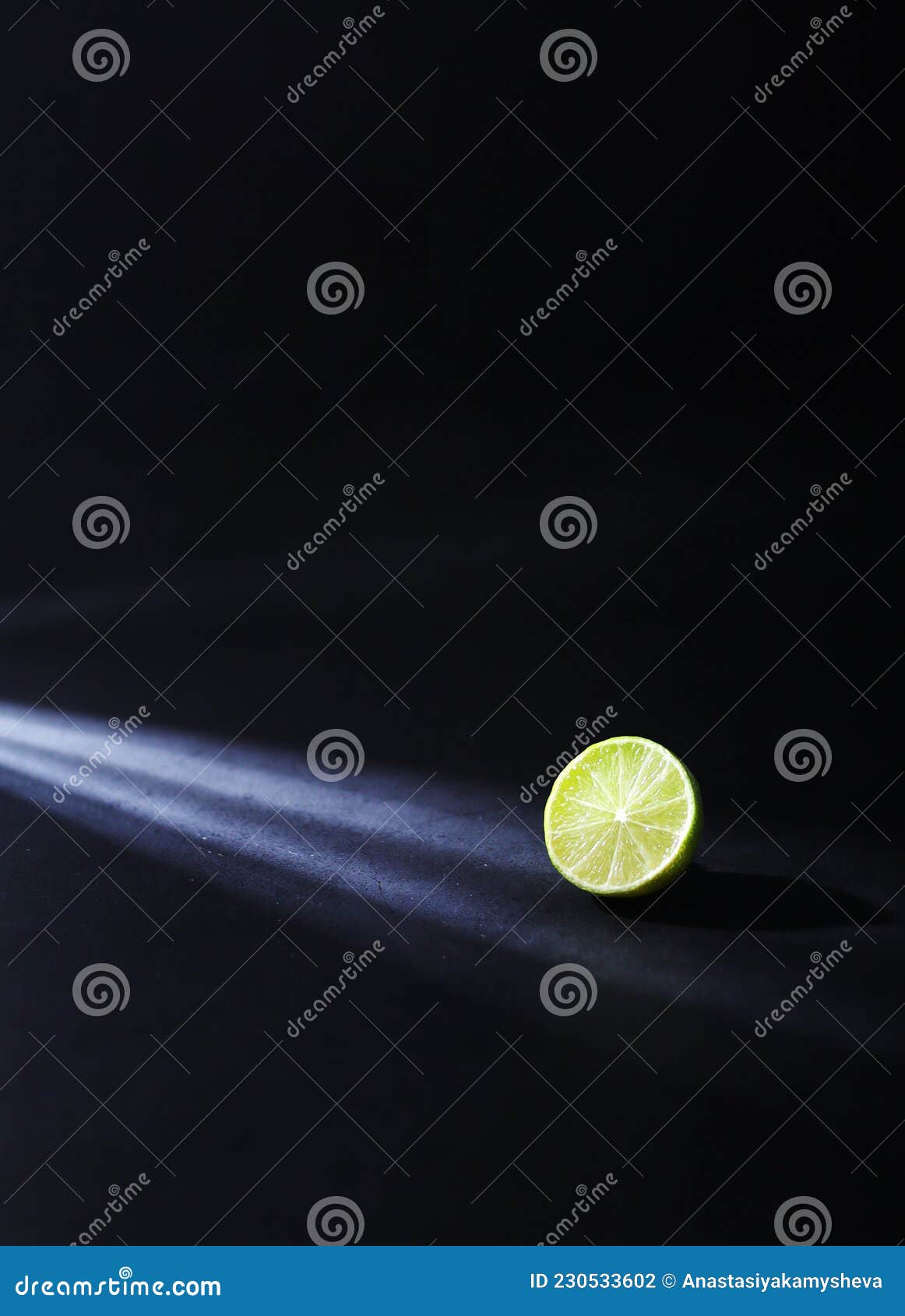 One Lime in Light Ray in Low Key Stock Photo - Image of background ...