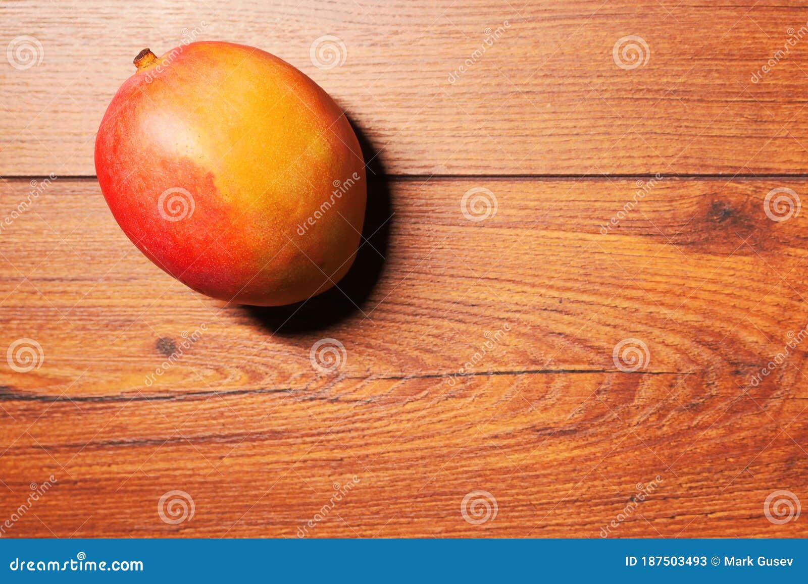 One Fresh Ripen Mango Fruit on a Brown Wooden Surface, Flat Lay, Copy ...