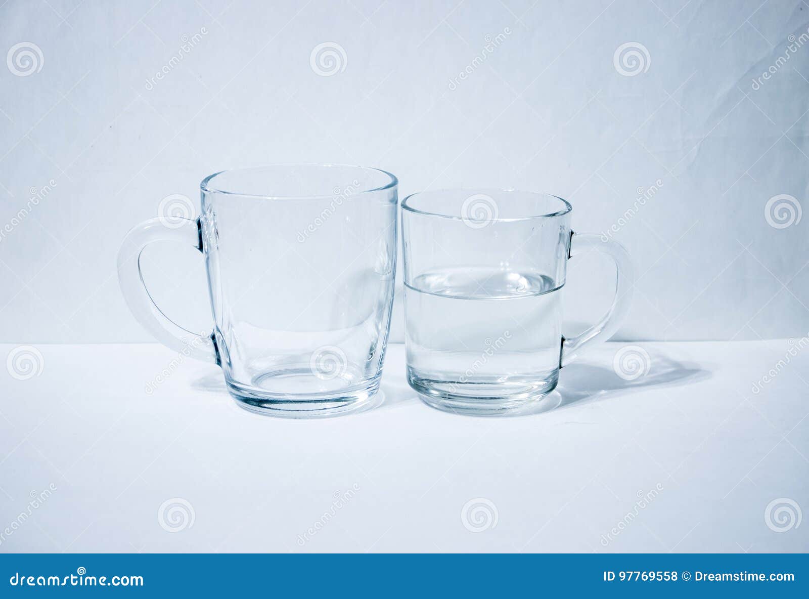 One Glass Empty Second with Water Stock Photo - Image of coupla, aqua ...