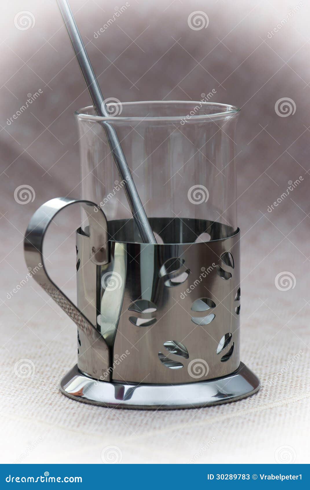 Glass mug in a steel frame stock image. Image of simplicity - 30289783
