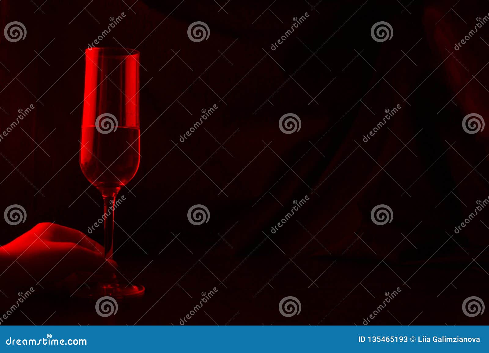 One glass in red light stock image. Image of crystal - 135465193