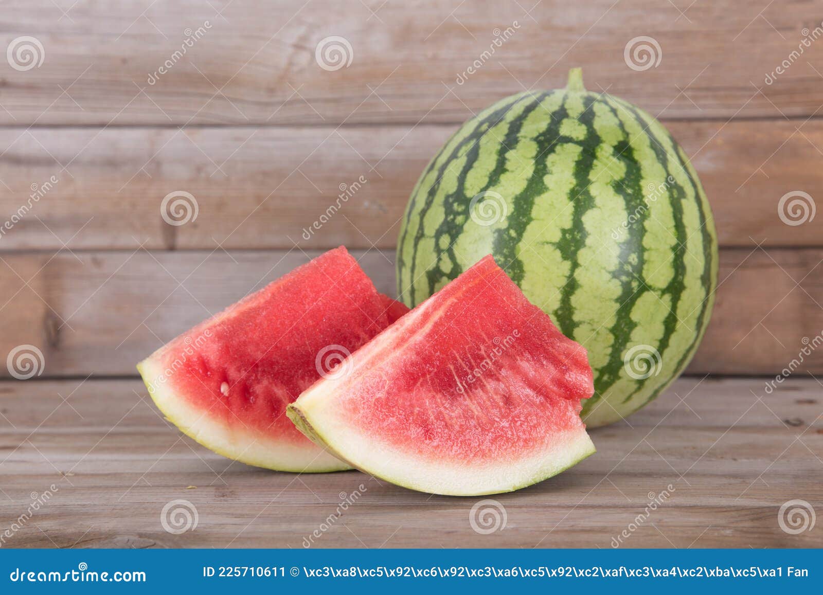 One Green-skin Watermelon and Two Cut Watermelons on the Table Stock ...