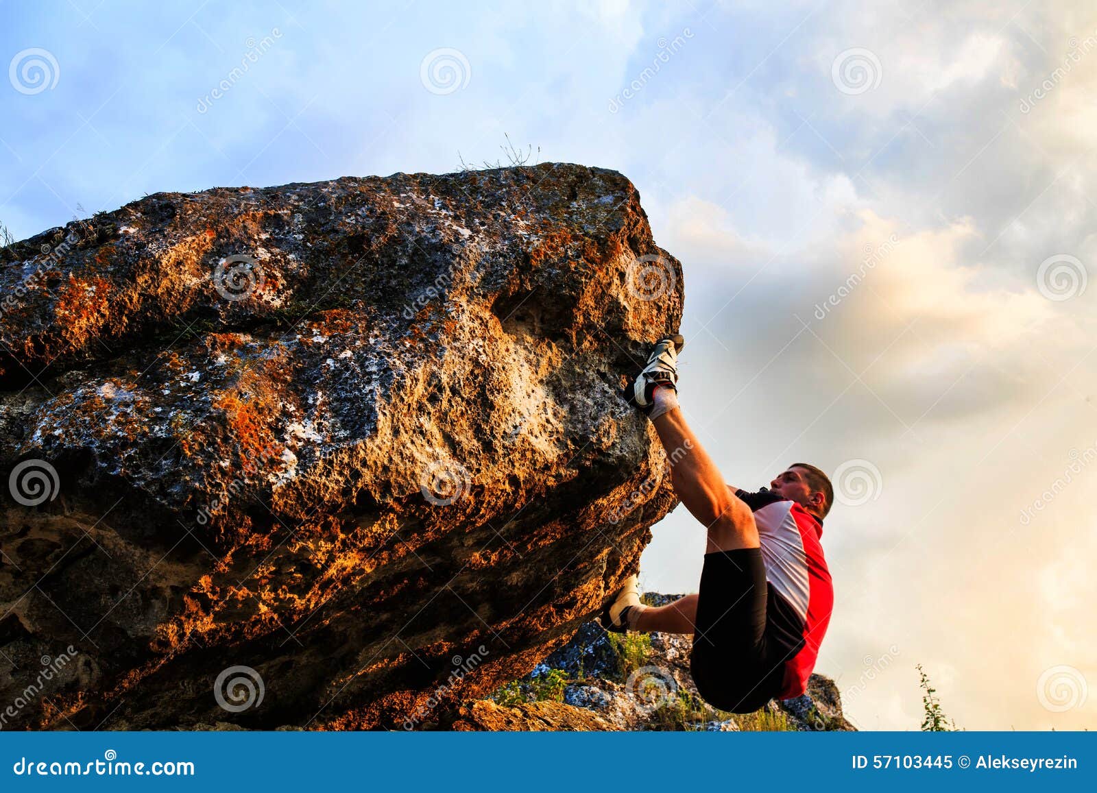 One guy climbs on a rock stock image. Image of outdoor - 57103445