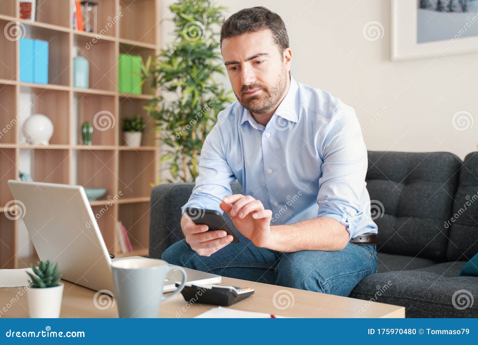 One Guy Working from Home Using Internet Connection Stock Photo - Image ...