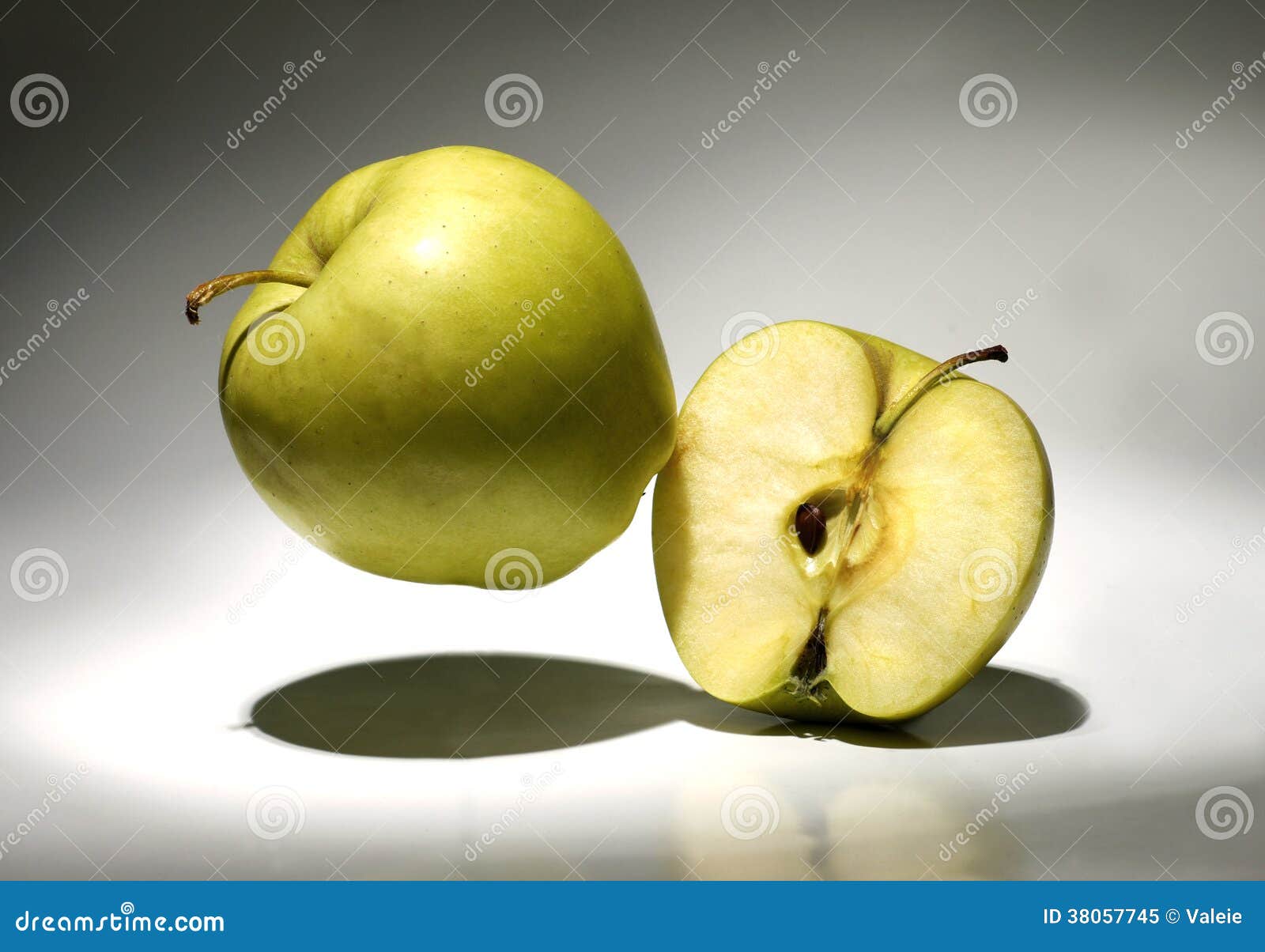 One and a half of apples stock image. Image of green - 38057745