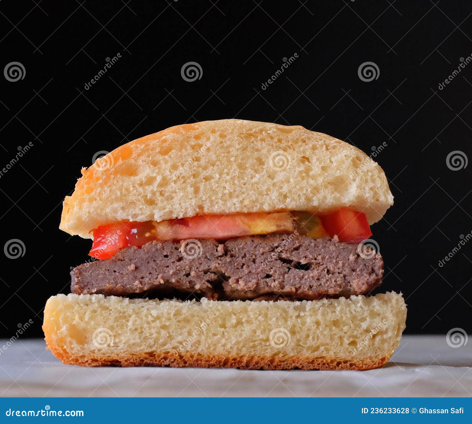 One Half of a Beef Burger (Front View) Stock Photo - Image of cuisine ...