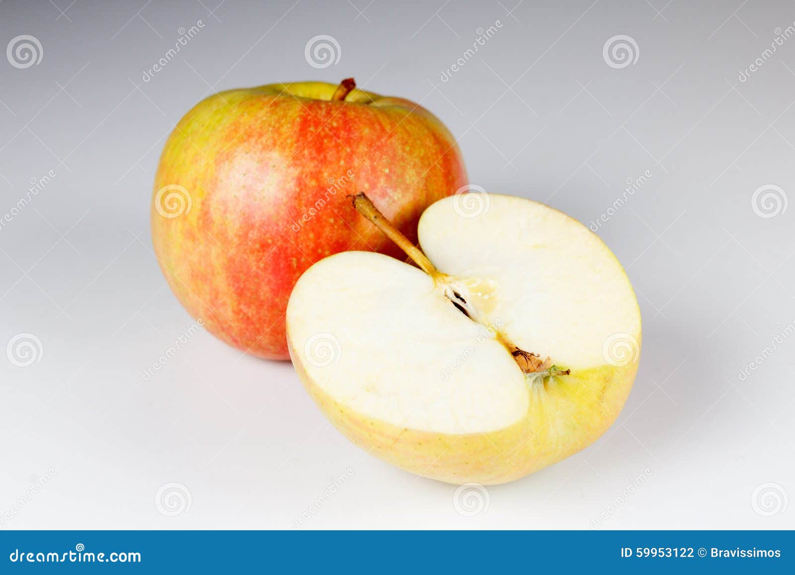 One and a half red apples stock photo. Image of leaf - 59953122