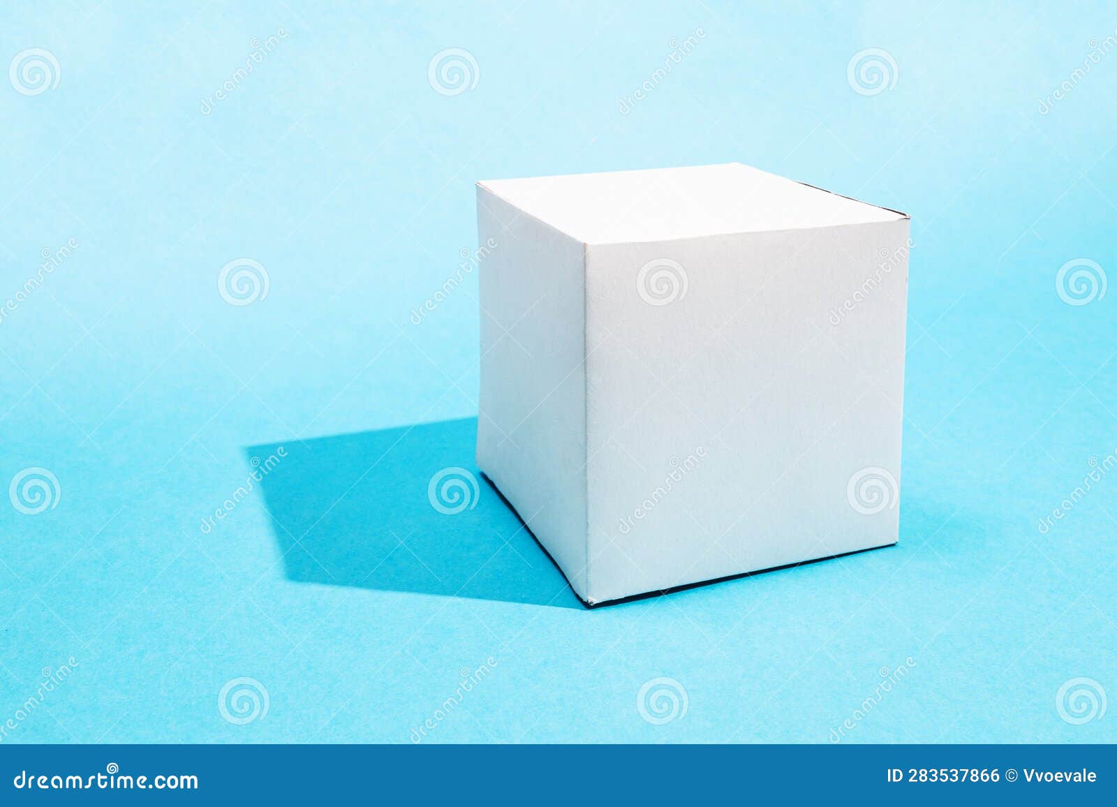 One Hand-crafted Paper Cube on Turquoise Blue Stock Photo - Image of ...
