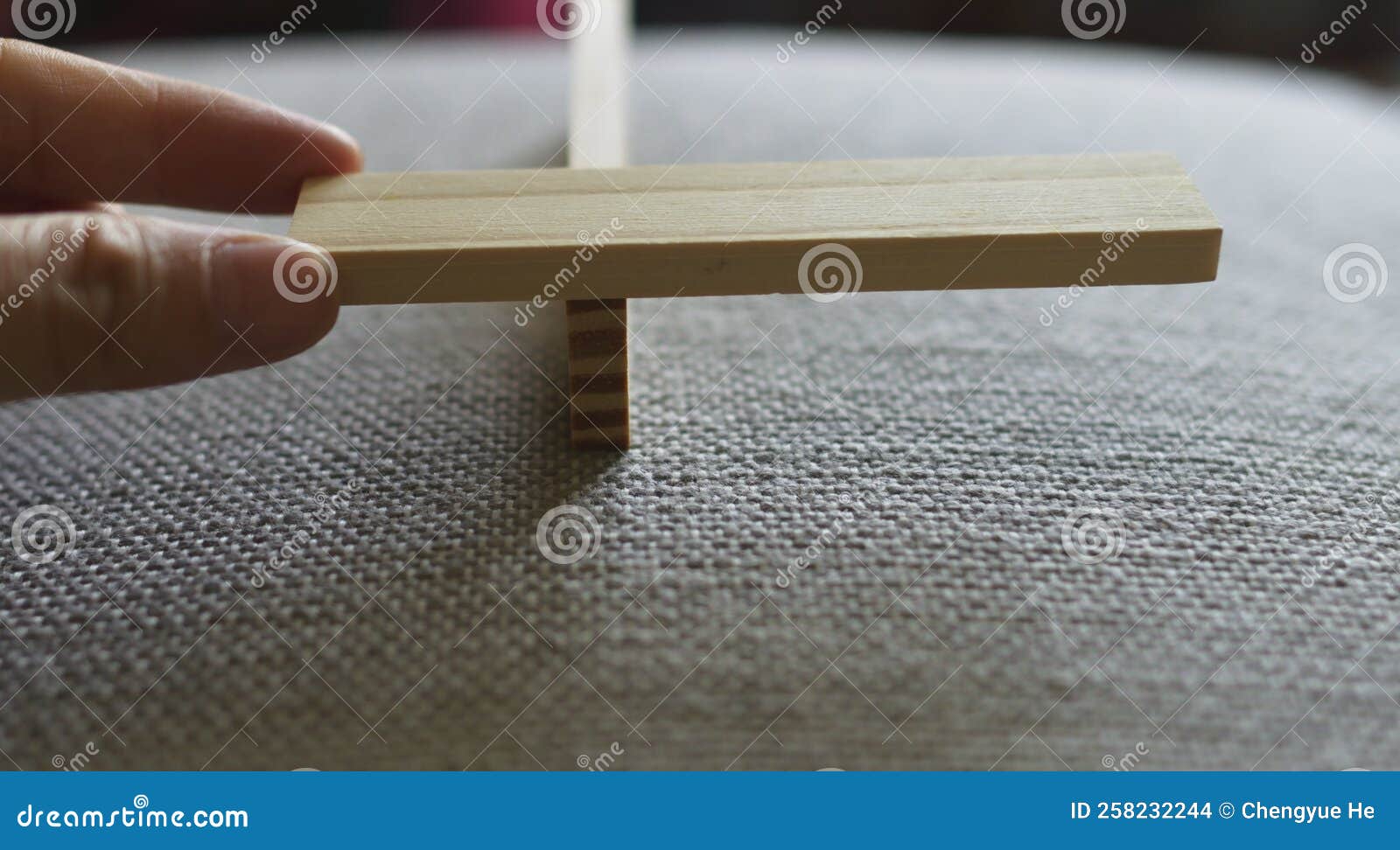 One Hand Holds a Block To Keep it Steady Stock Photo - Image of ...