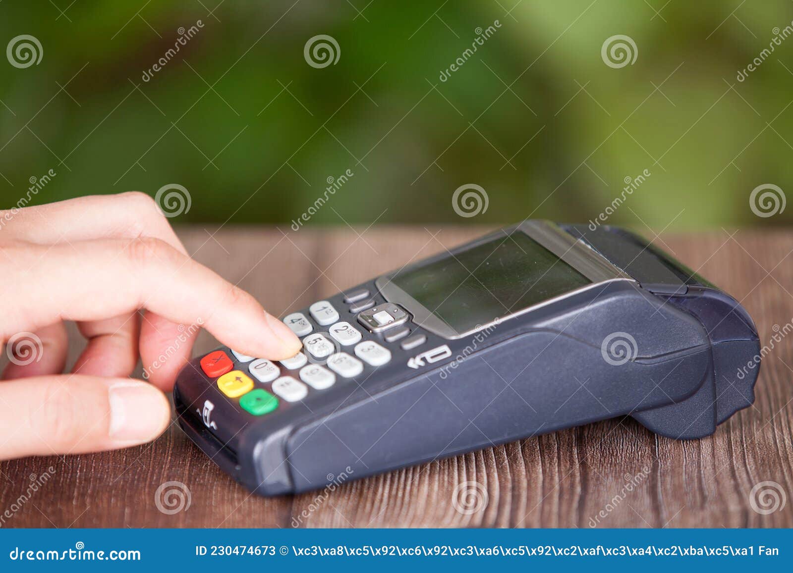 One Hand is Inputting the Amount of Payment on the POS Machine Stock ...