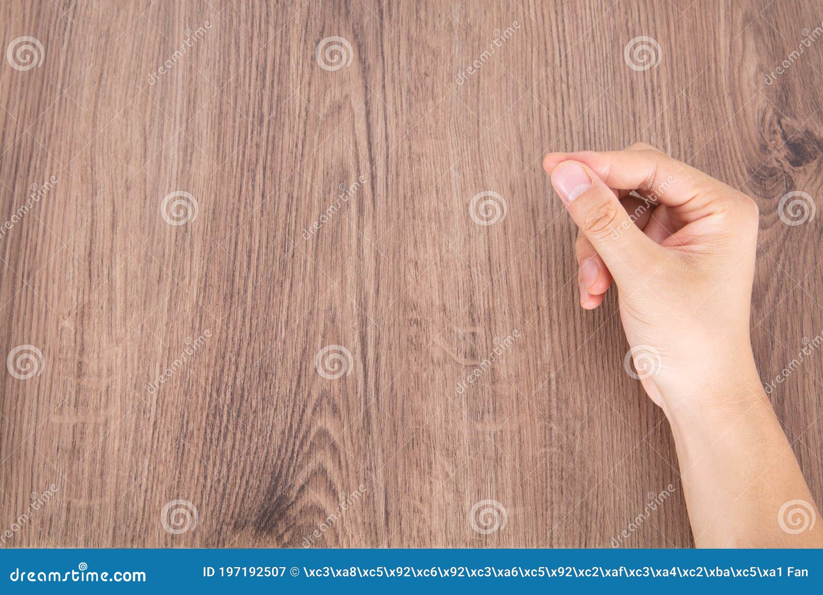 One Hand on the Table Making a Gesture of Pinching Something Stock ...