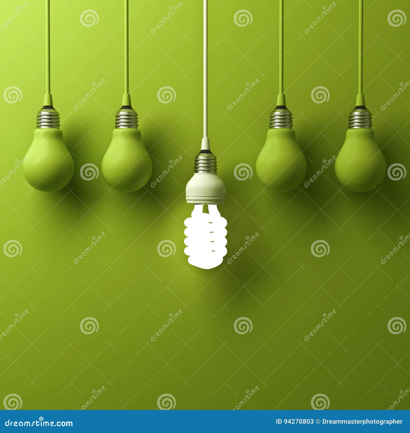 One Hanging Energy Saving Light Bulb Glowing Different Standing Out ... One Hanging Energy Saving Light Bulb Glowing Different Standing Out ...