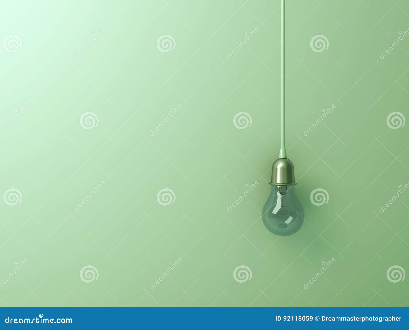 One Hanging Turn Off Incandescent Light Bulb on Green Wall Background ...