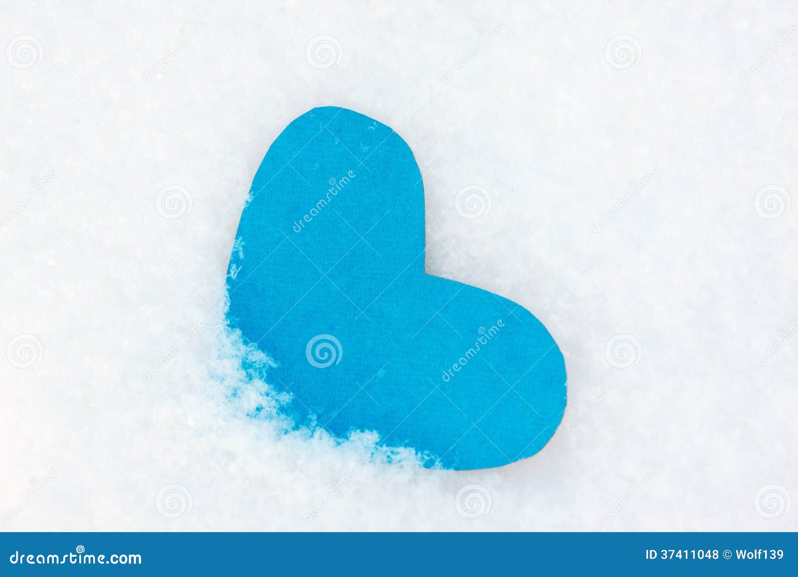 One Heart Shape from Blue Paper in the Snow Stock Photo - Image of snow ...
