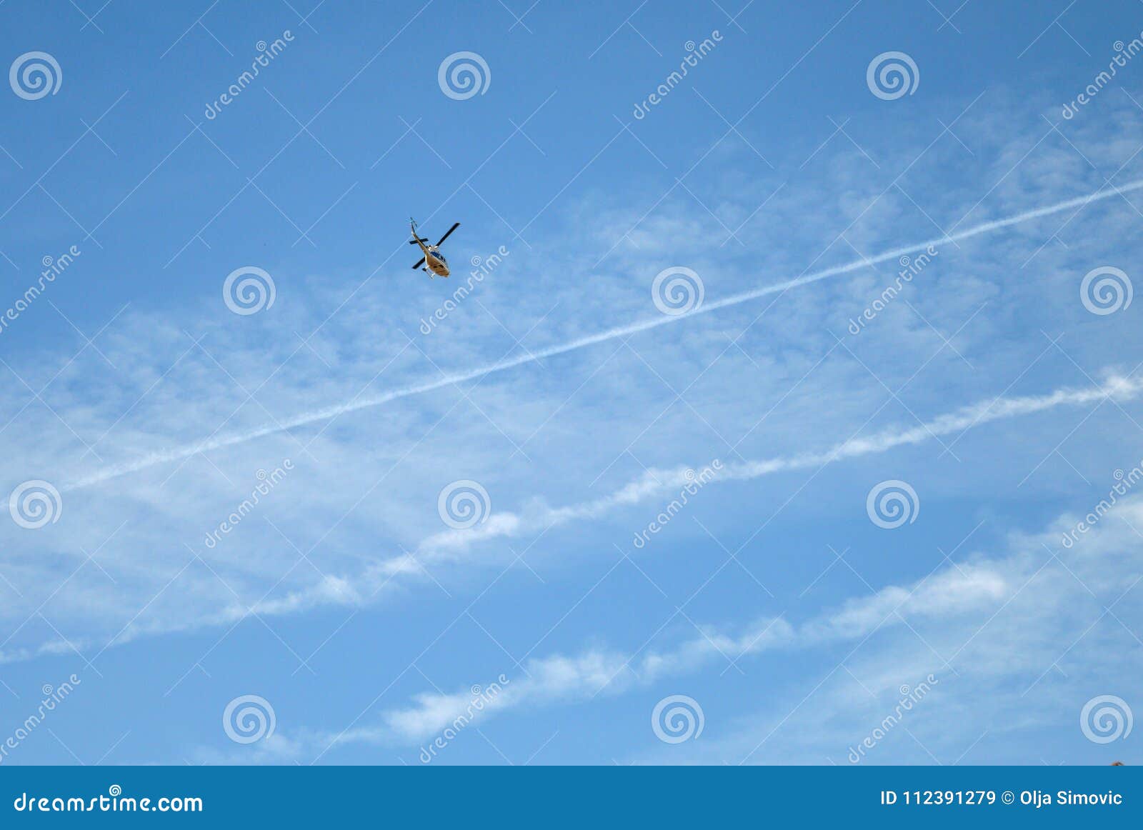 Helicopter in the clouds stock image. Image of clouds - 112391279