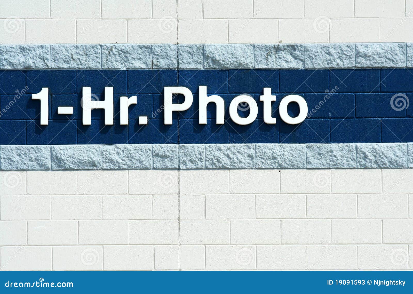 One hour photo sign stock image. Image of blue, texture - 19091593