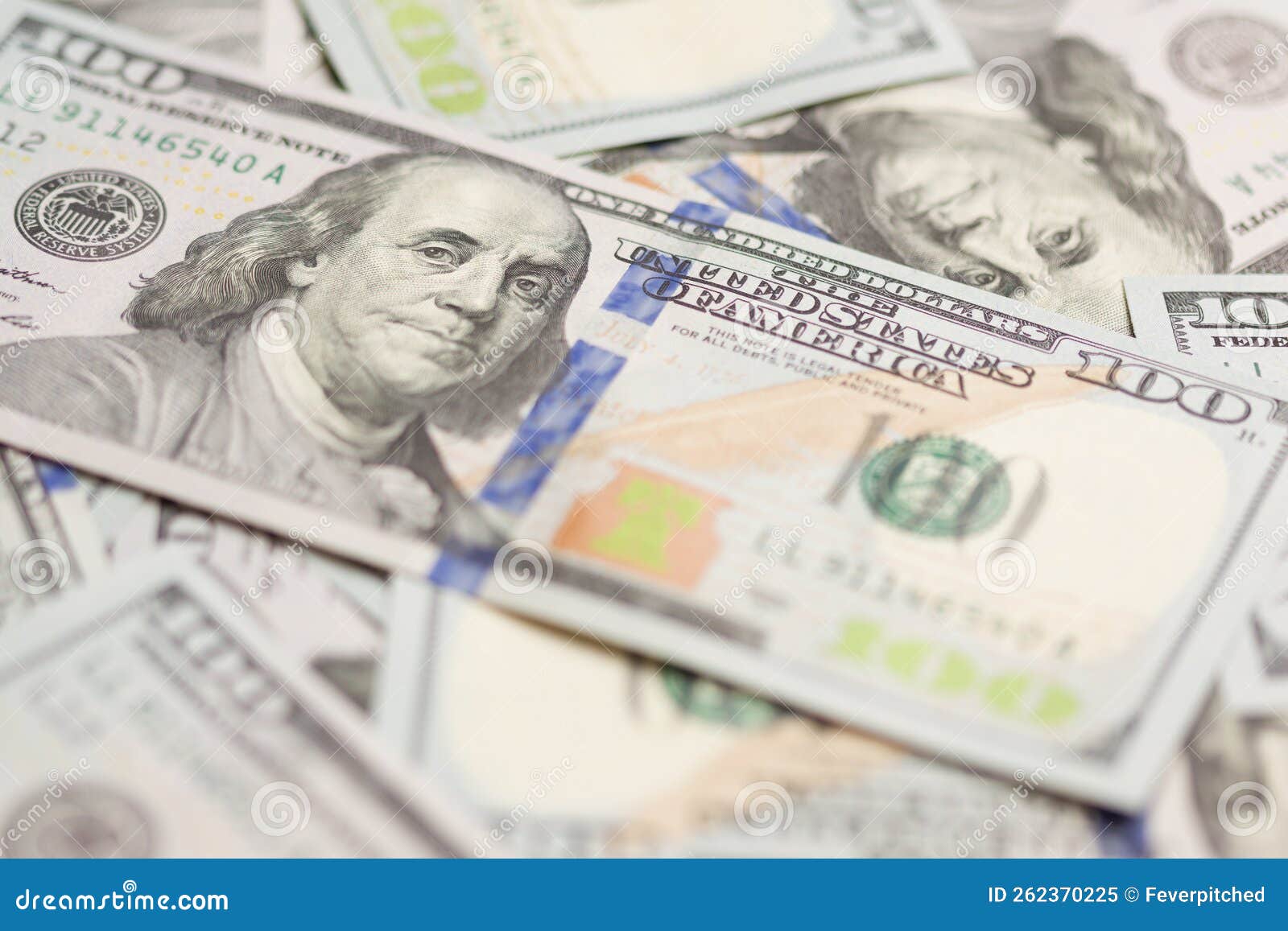 One Hundred Dollar Bills Laying on Flat Surface Stock Image - Image of ...