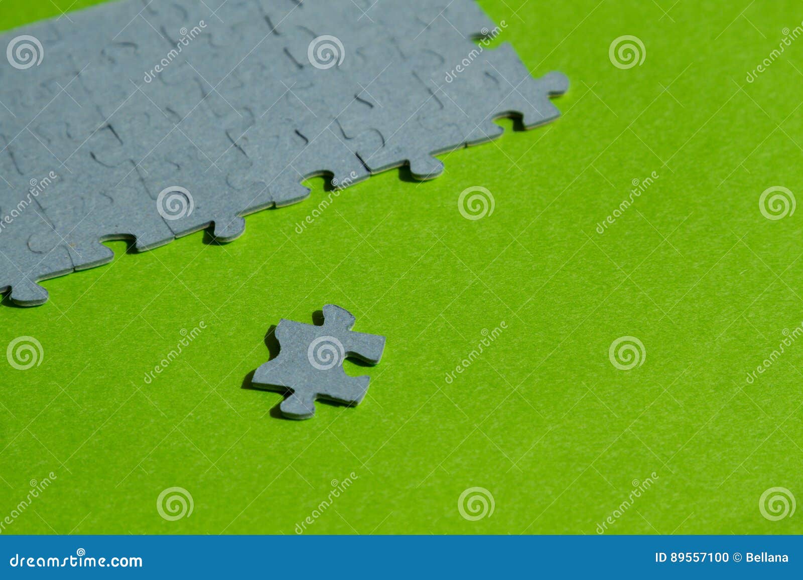 One Jigsaw Puzzle Piece Cut Out on Green Background Stock Photo - Image ...