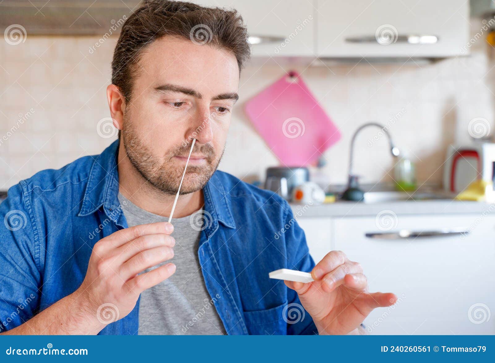 One Man Holding Self-testing Swab and Rapid Test for Coronavirus/COVID ...