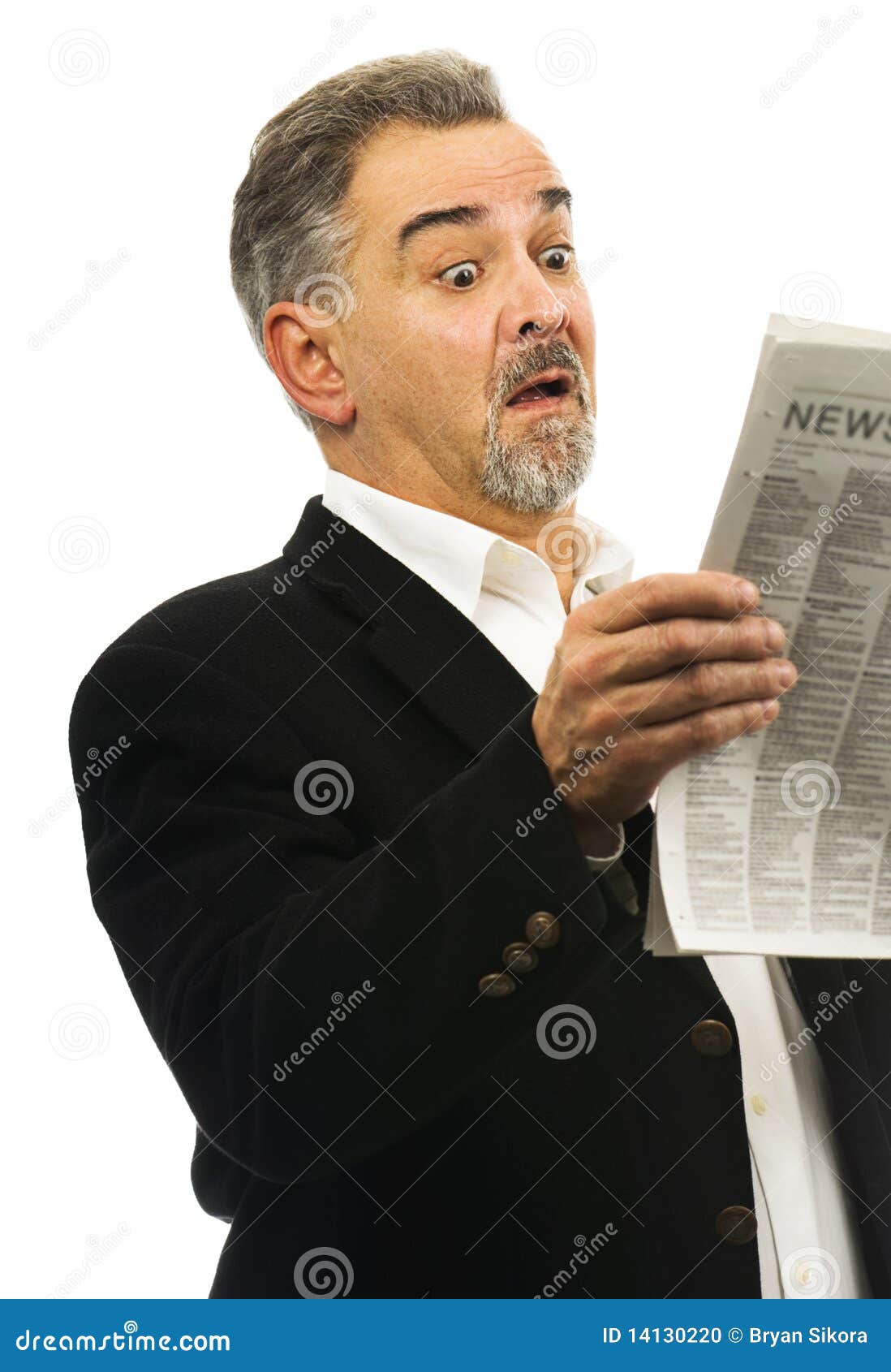One Man Looks at Newspaper with Look of Shock Stock Photo - Image of ...