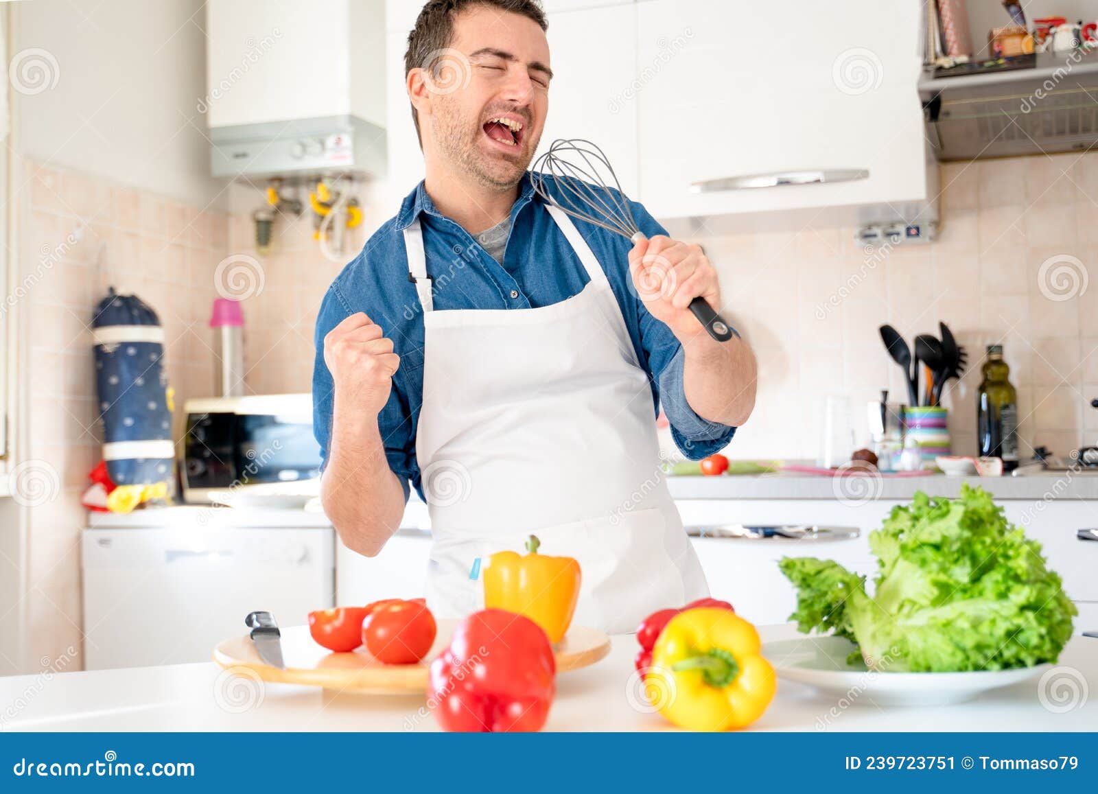 One Man is Singing in the Kitchen while Cooking Stock Image - Image of ...