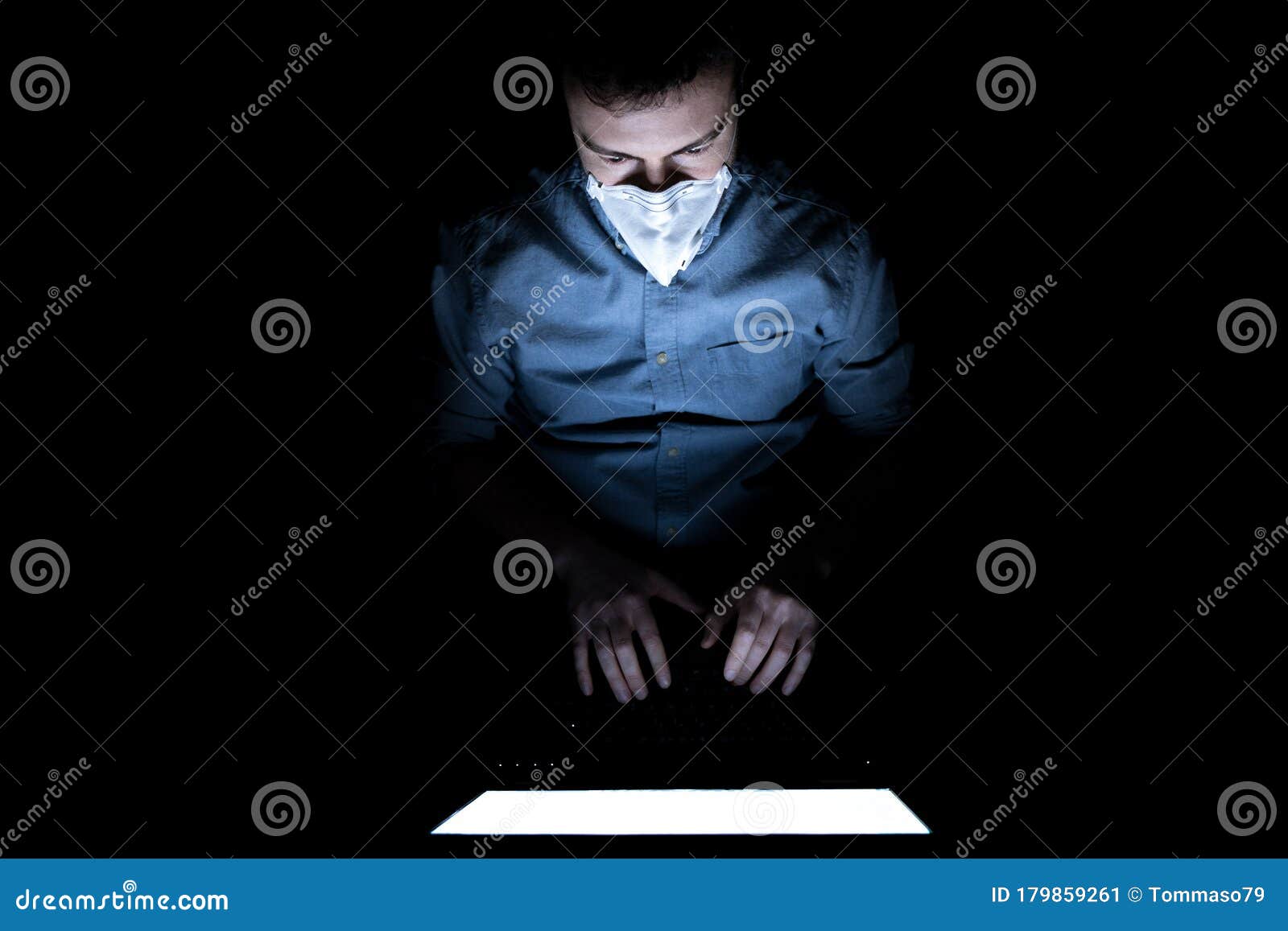 One Man Working Alone at Night Using Notebook during Quarantine Stock ...