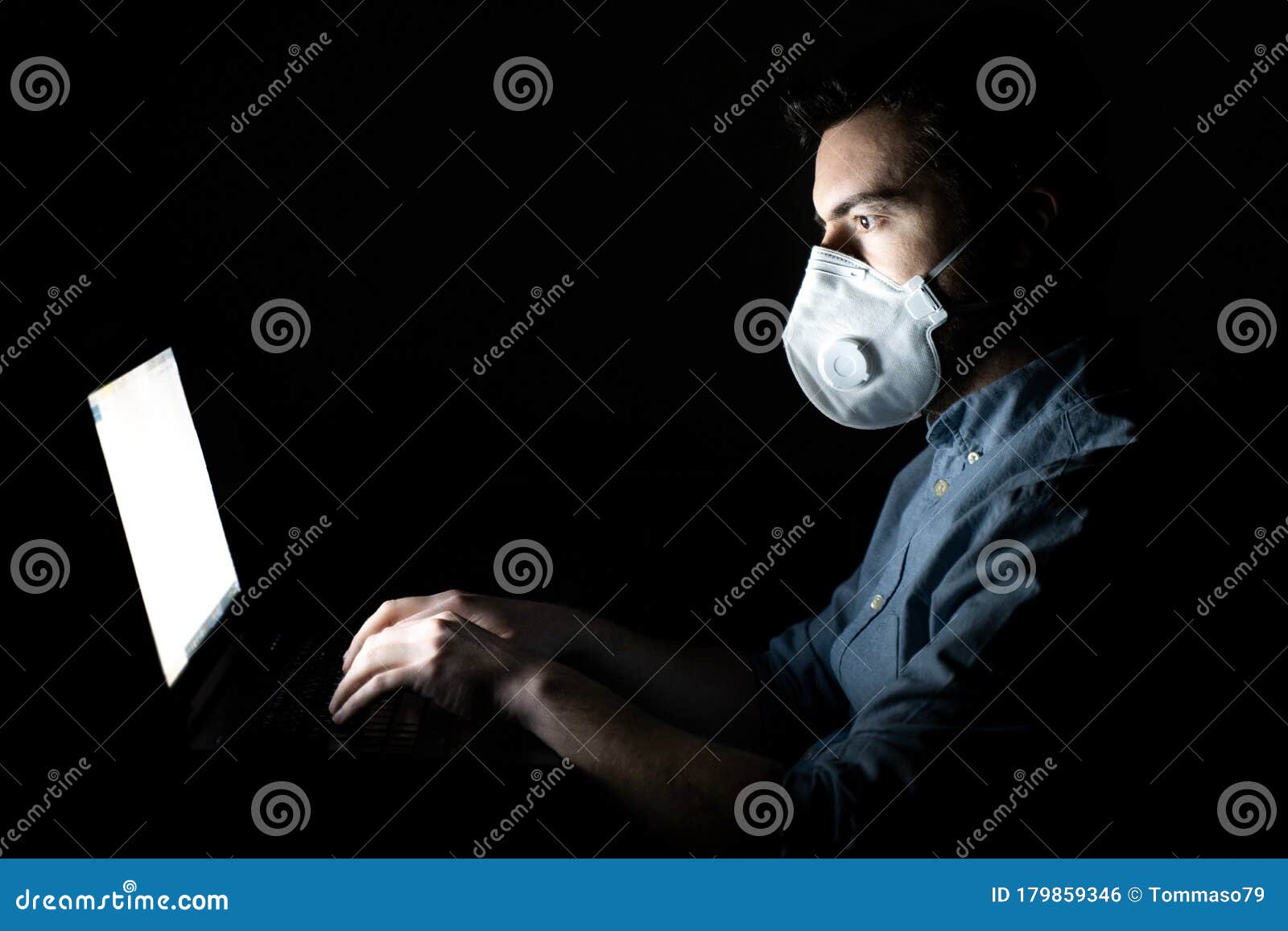One Man Working Alone at Night Using Notebook during Quarantine Stock ...